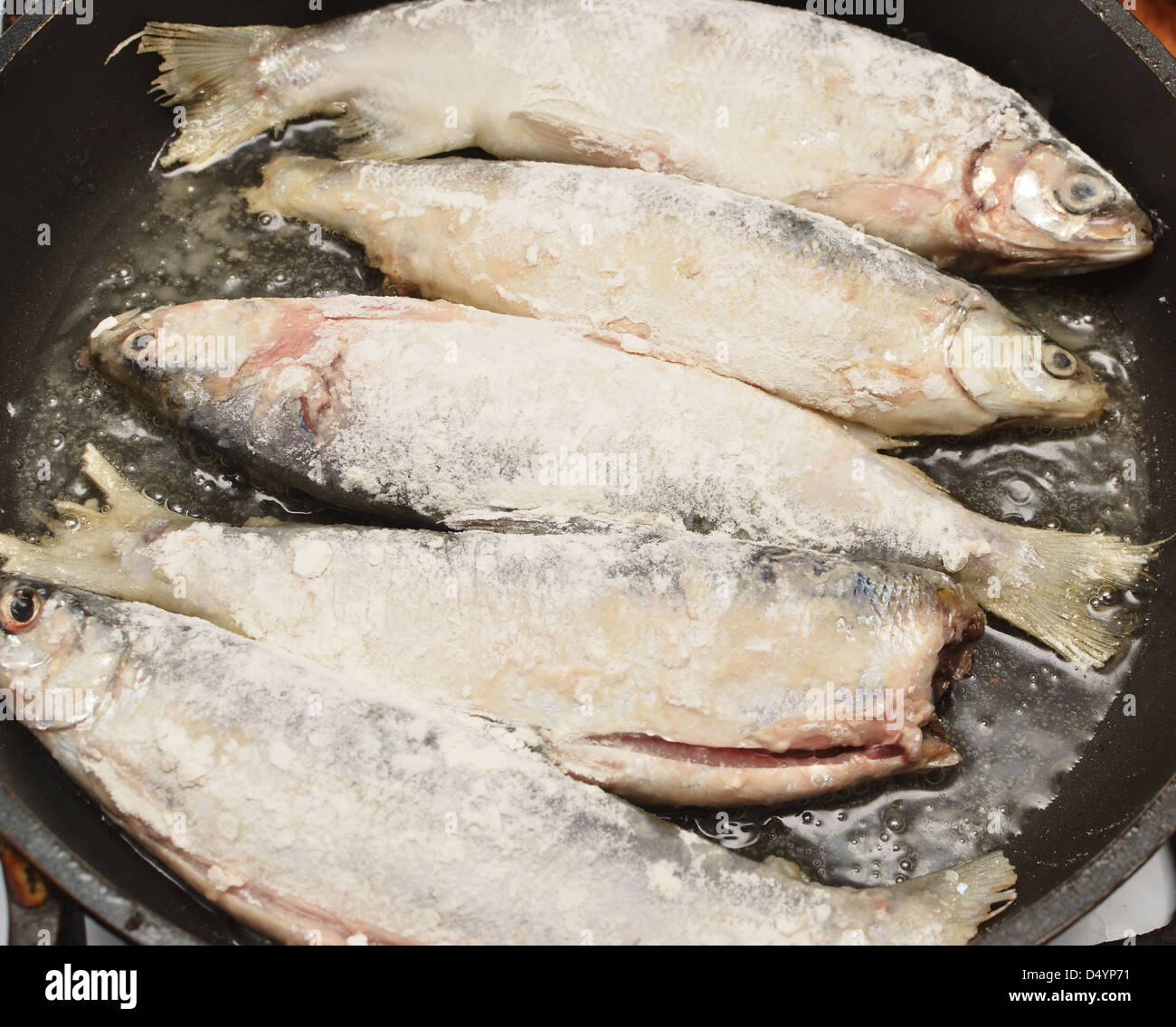 Fish in flour hi-res stock photography and images - Alamy