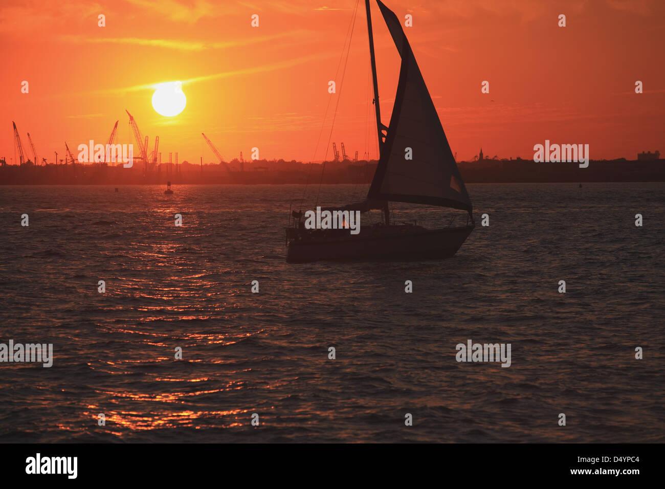 Boat sailing at sunset in New York, USA Stock Photo - Alamy