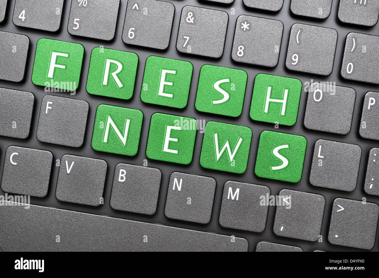 Fresh news on keyboard Stock Photo - Alamy
