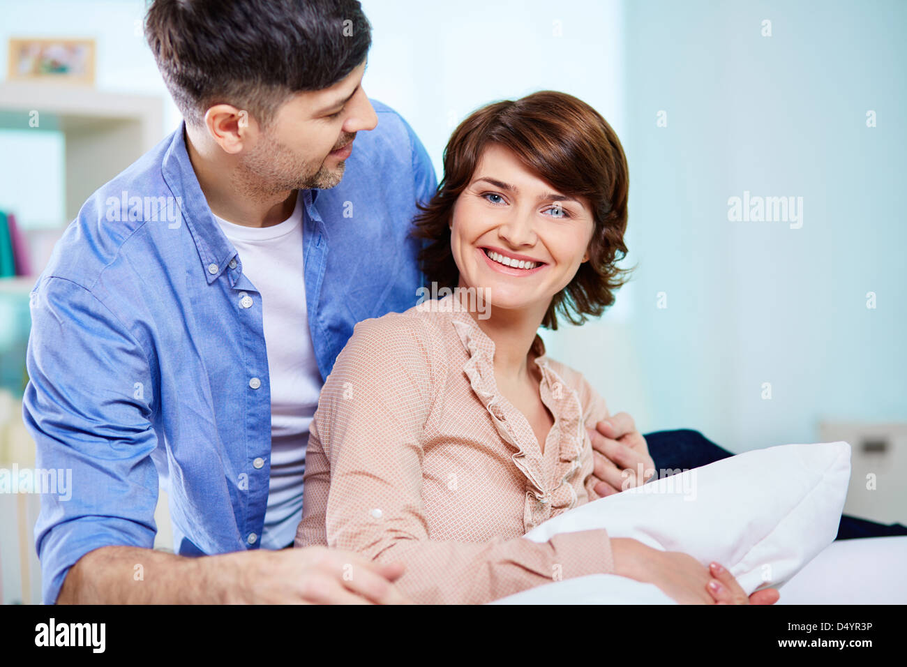Portrait of middle aged couple having rest at home Stock Photo - Alamy