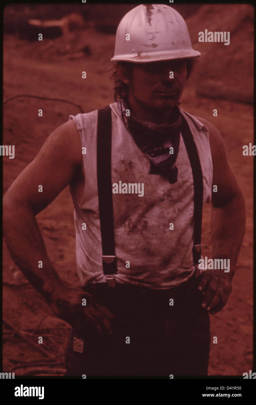 A 'cat skinner' operates a Caterpillar tractor during post-fire salvage ...