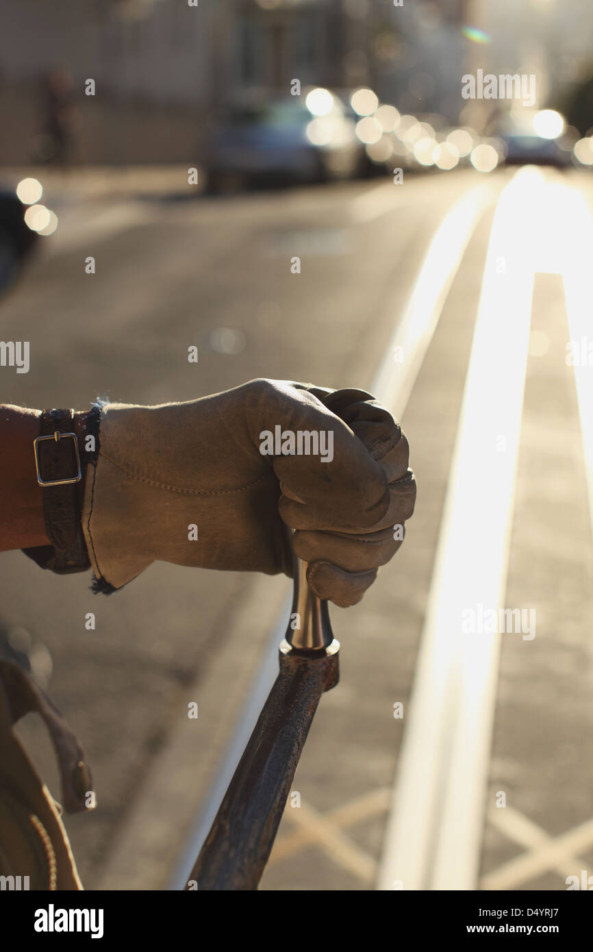 Man holding a lever, San Francisco, USA Stock Photo - Alamy