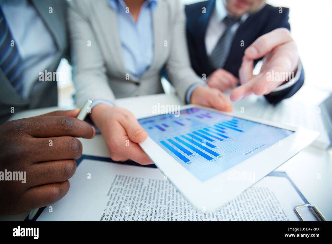 Image of human hands during discussion of business document in ...