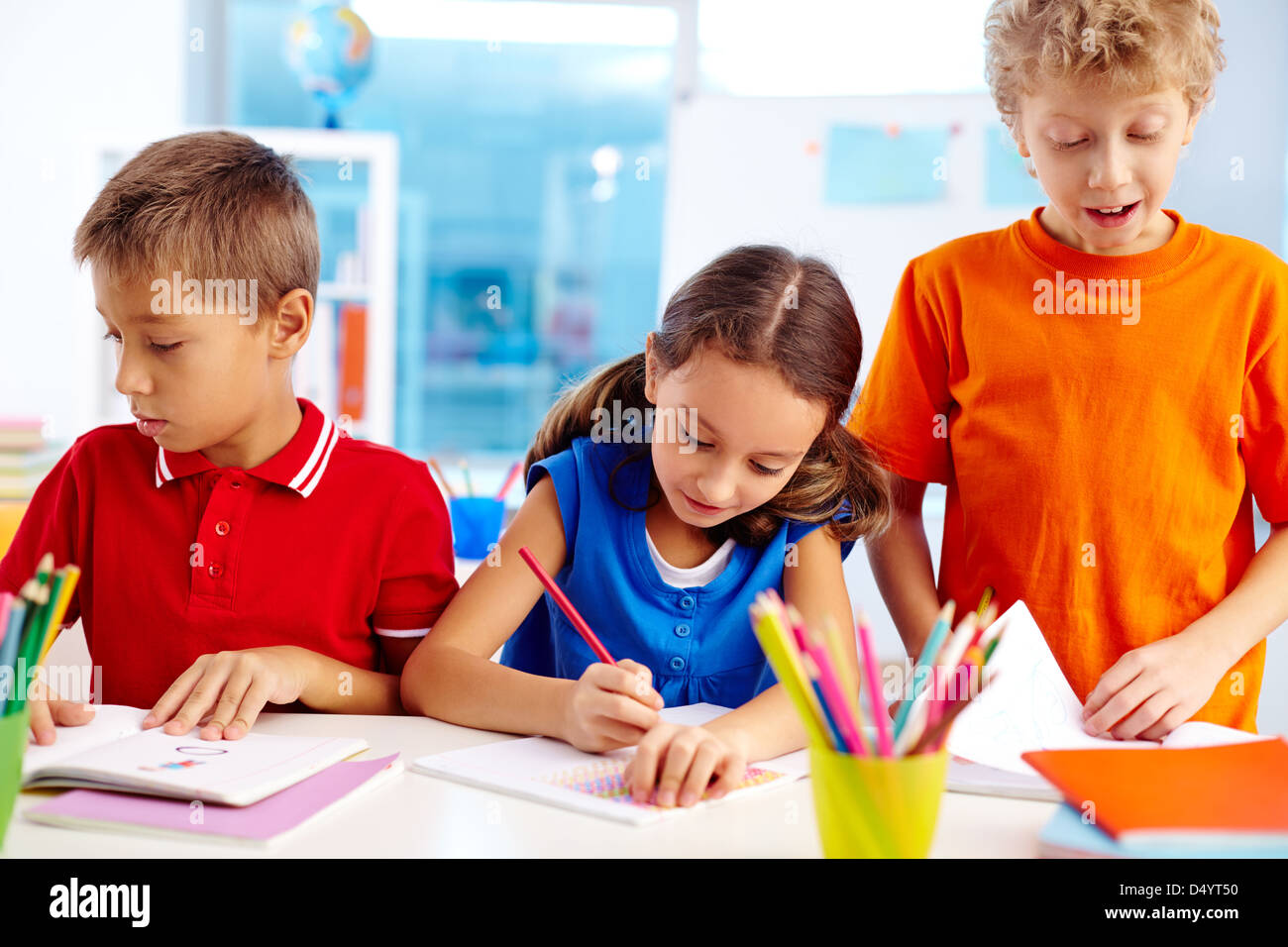 Pupils being busy with school work Stock Photo - Alamy