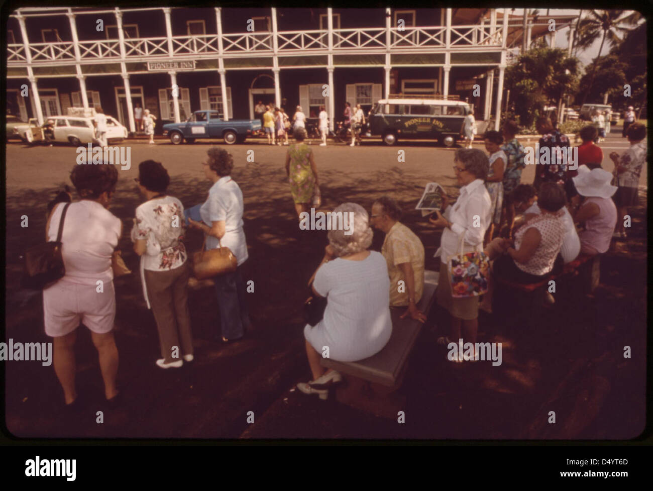 A photograph from October 1973 showing tourists disembarking from buses ...