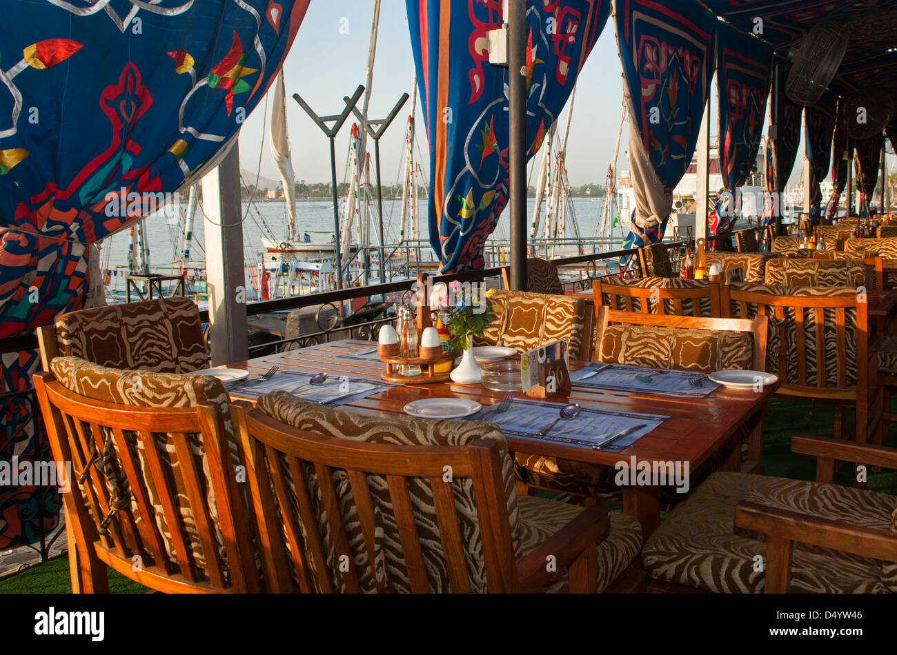 An empty restaurant situated at Nile riverside in Luxor Egypt Stock ...