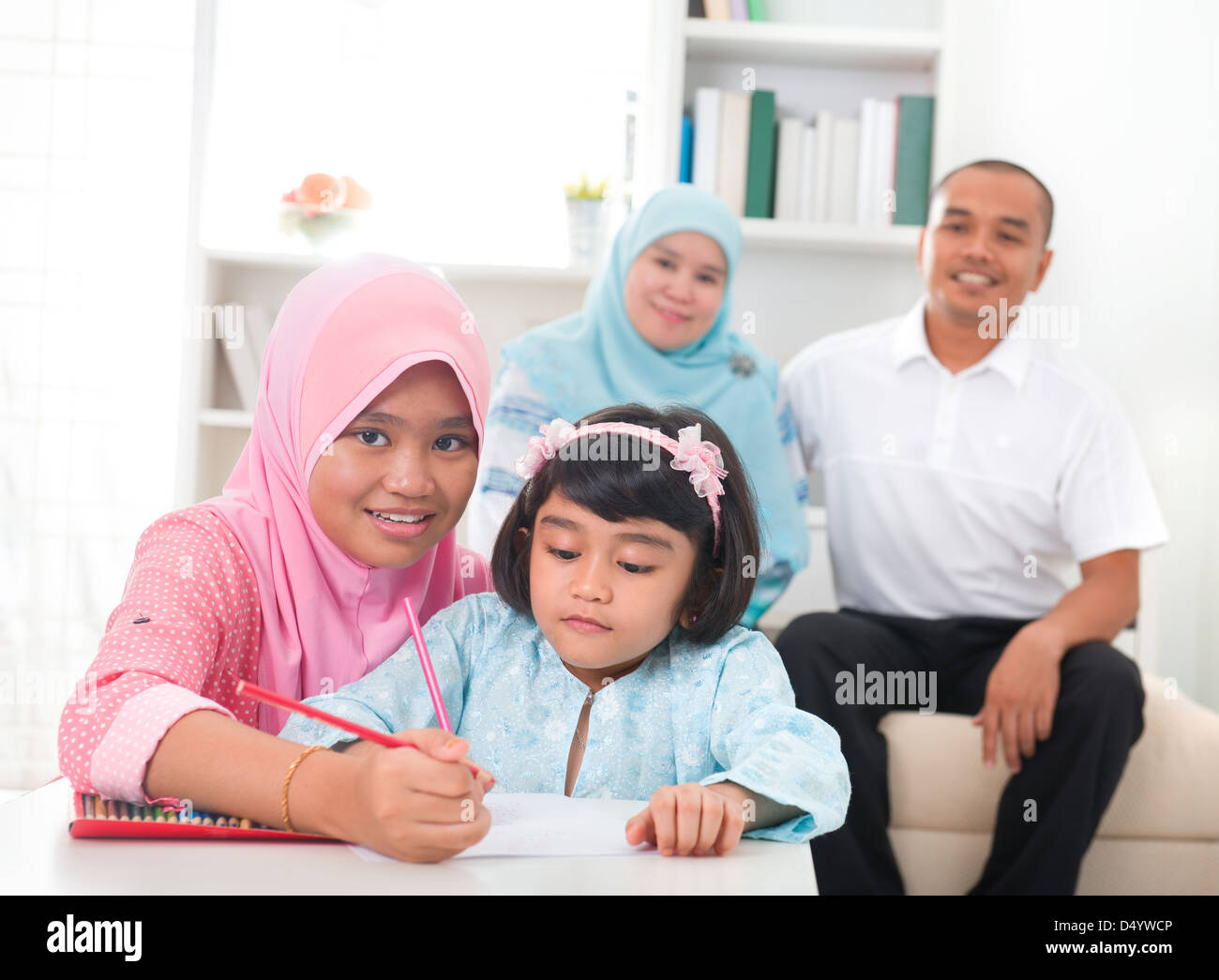 malay family learning together with lifestyle background Stock Photo ...