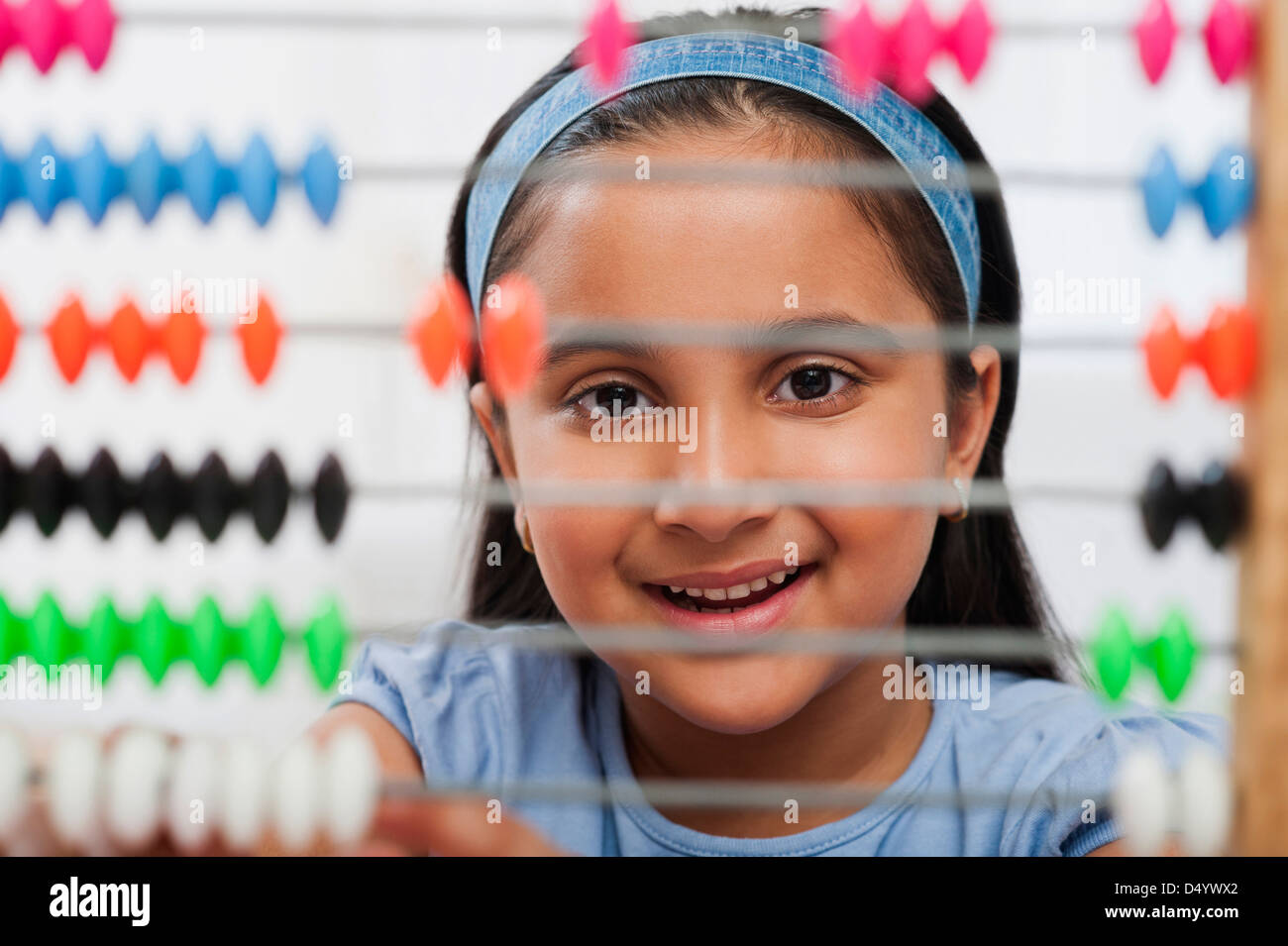 Girl using an abacus Stock Photo - Alamy