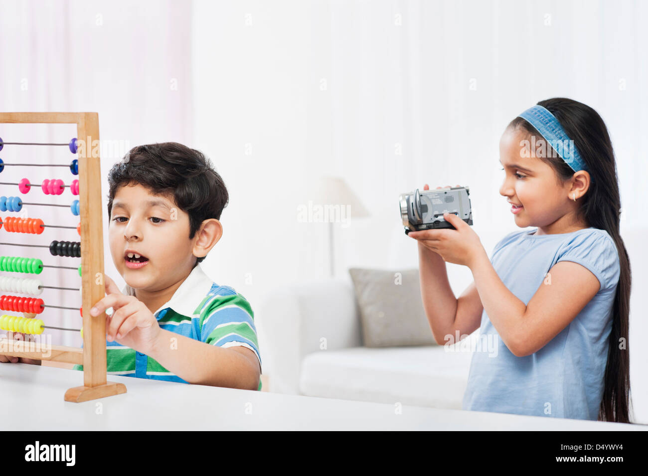 Boy filming friends hi-res stock photography and images - Alamy