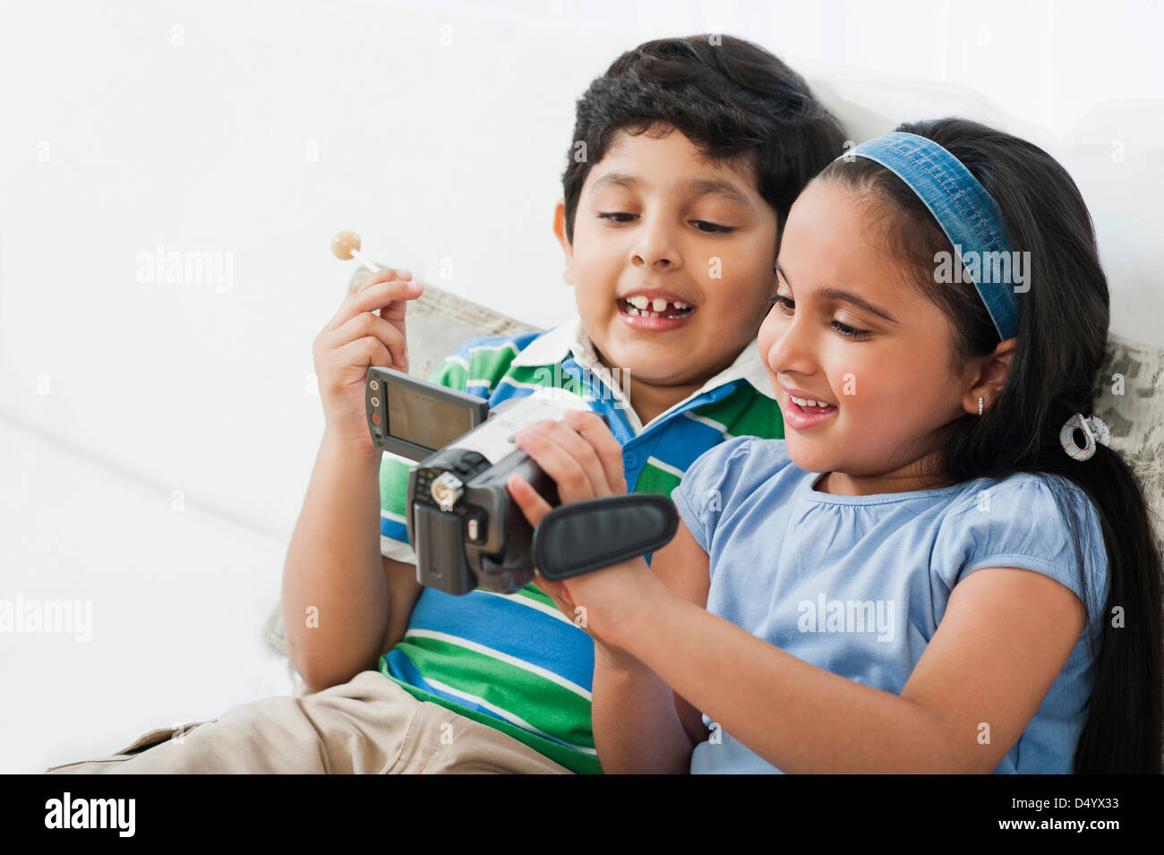 Children filming themselves with a video camera Stock Photo - Alamy