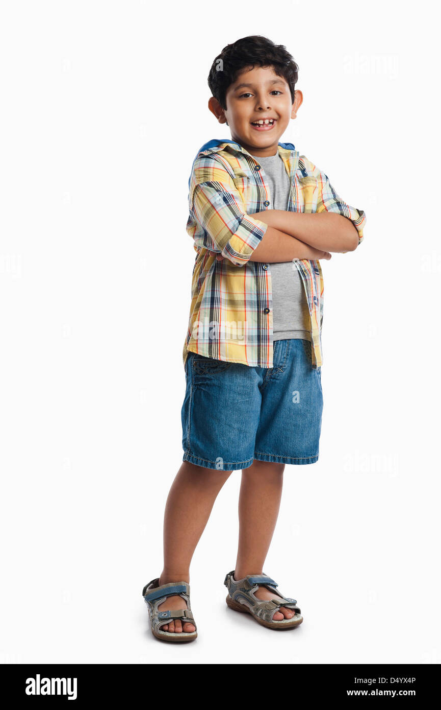 Boy standing with his arms crossed Stock Photo - Alamy