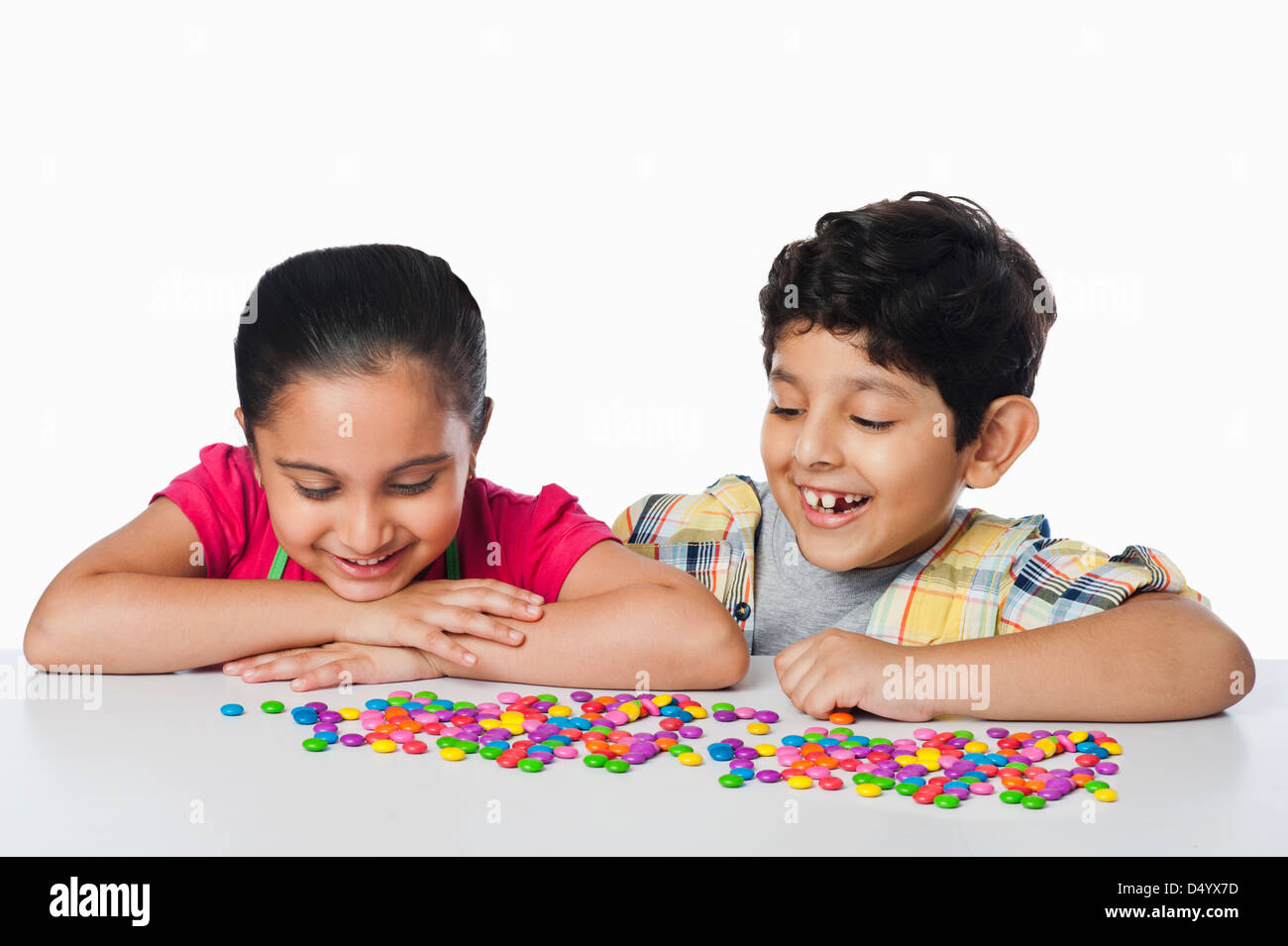Children playing with candies Stock Photo - Alamy