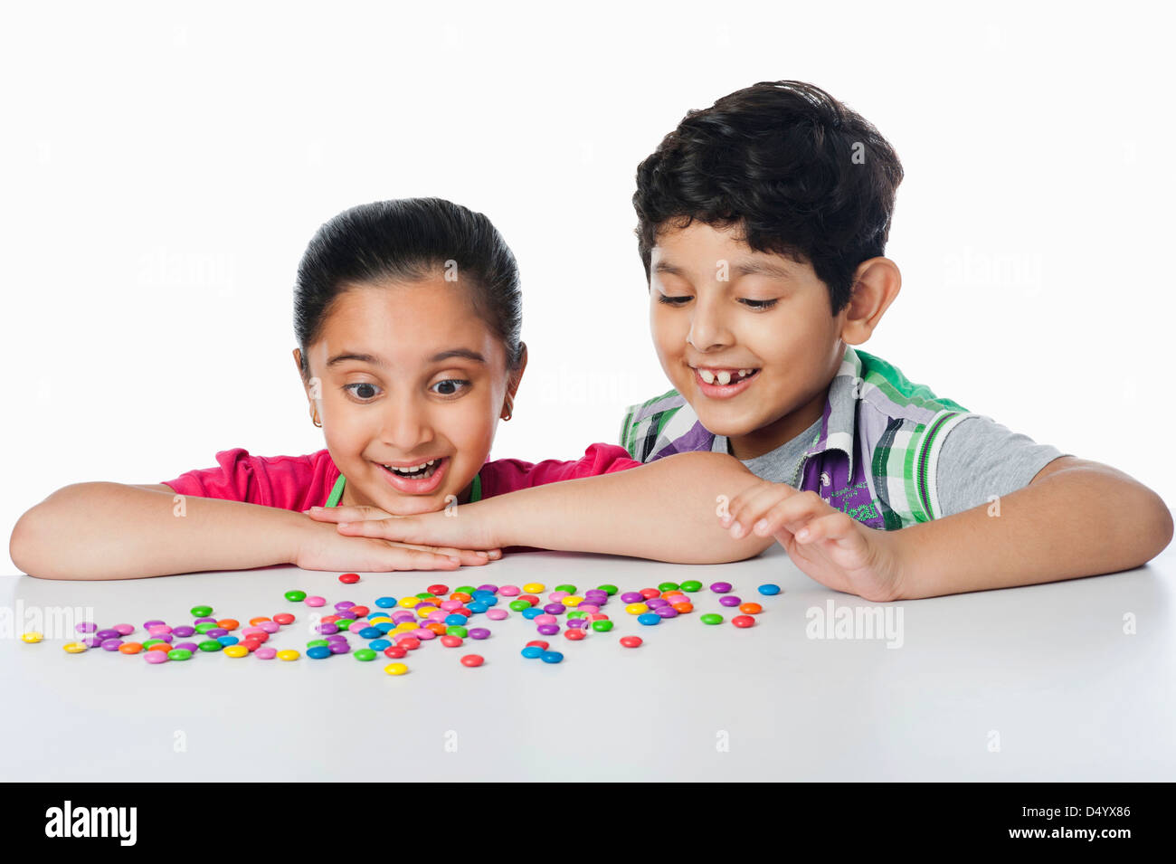 Children playing with candies Stock Photo - Alamy