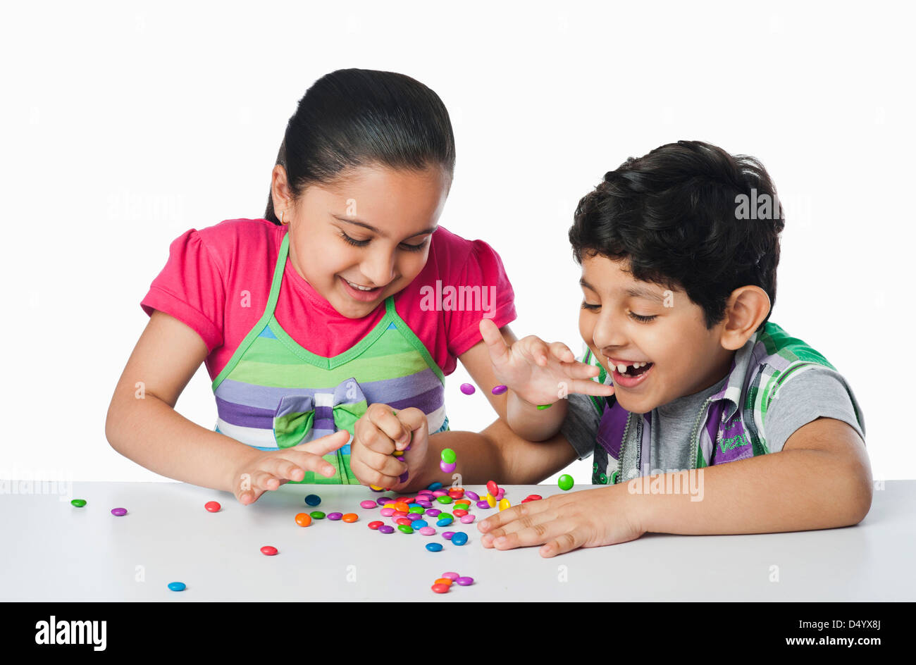 Smiling children sweet candies hi-res stock photography and images - Alamy