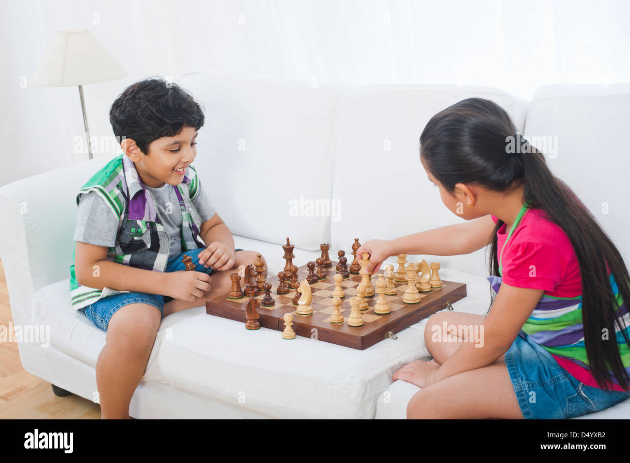 Children playing chess Stock Photo - Alamy
