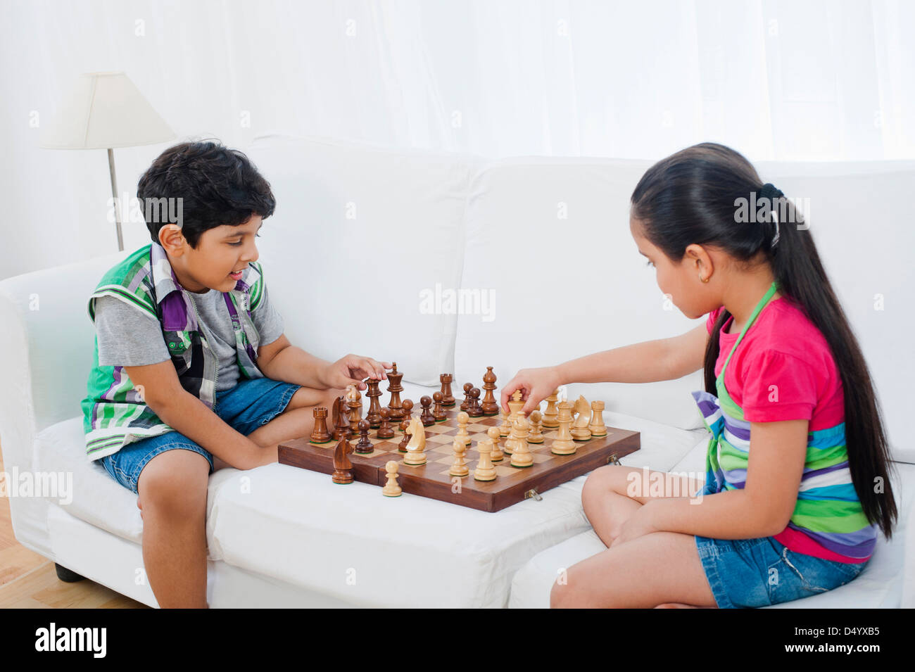 Children playing chess Stock Photo - Alamy
