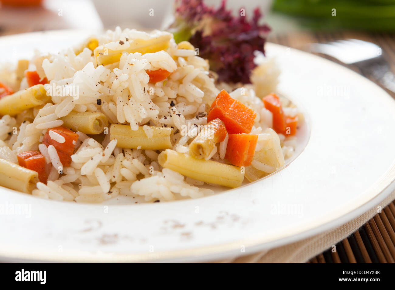 large plate of delicious rice with vegetables, closeup Stock Photo - Alamy