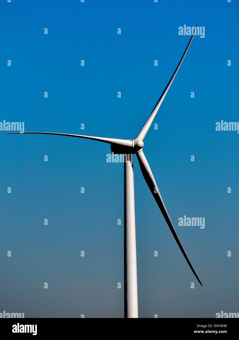 A windmill farm rotates over a Northwestern Indiana farm field Stock ...