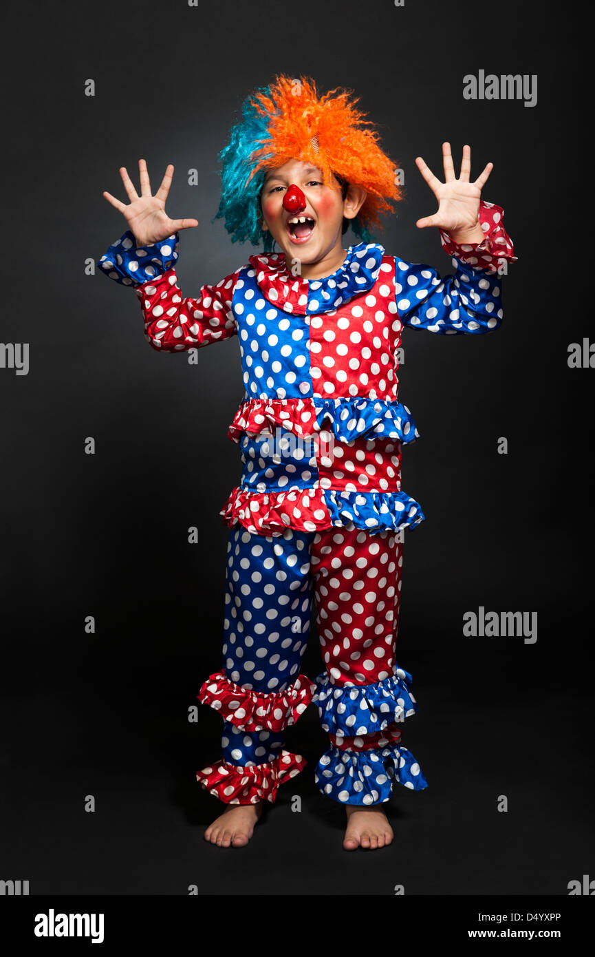 Boy imitating like a clown Stock Photo - Alamy