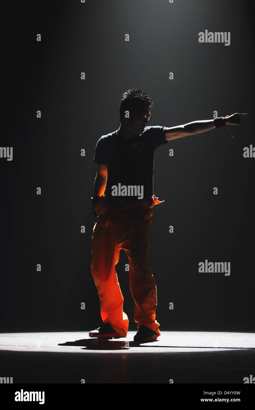 Dancer in the spotlight Stock Photo - Alamy