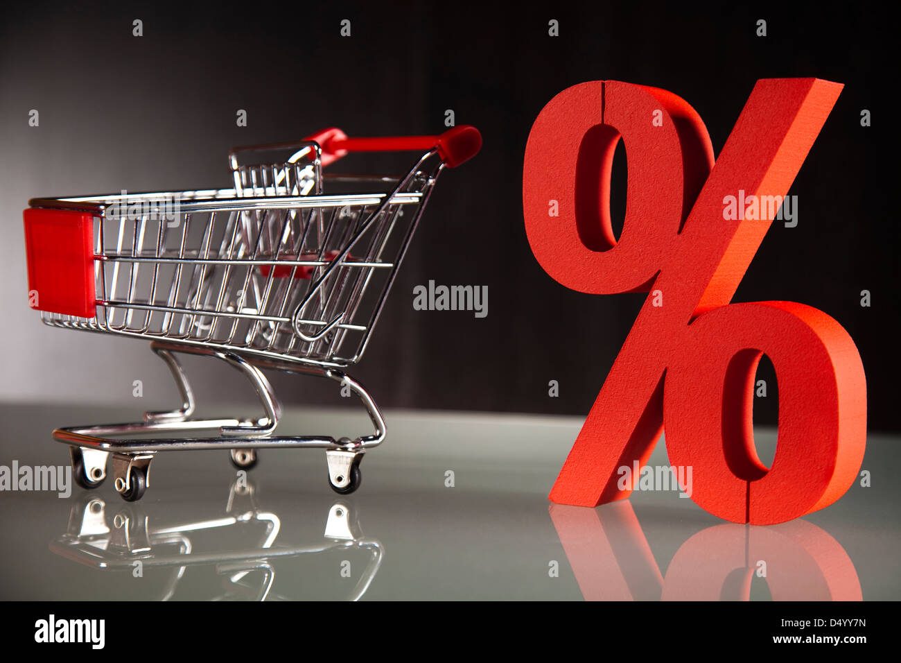 Shopping supermarket cart, percent sign Stock Photo - Alamy
