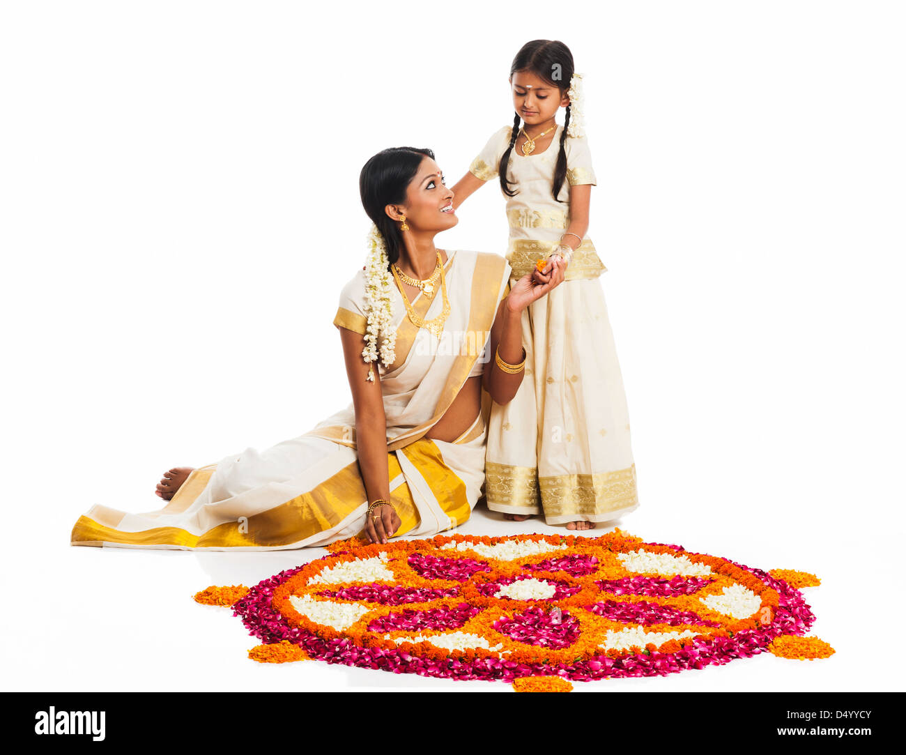 Indian girls design rangoli traditional hi-res stock photography and ...