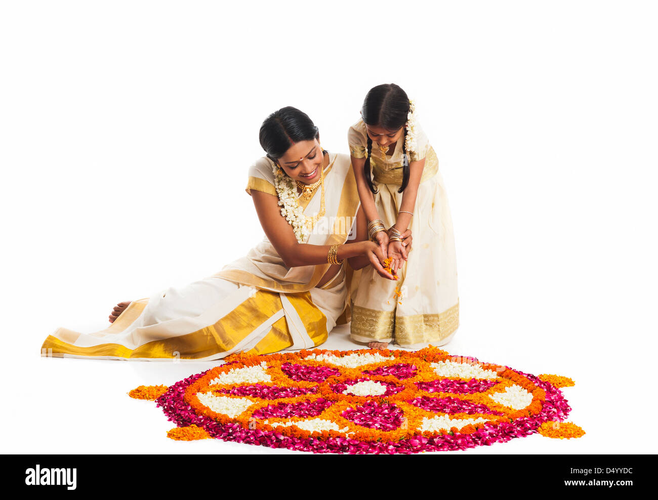 Indian girls design rangoli traditional hi-res stock photography and ...