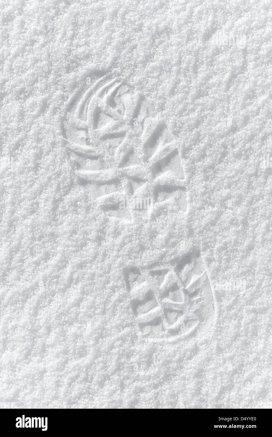 Texture of man's footprint in fresh soft snow Stock Photo - Alamy