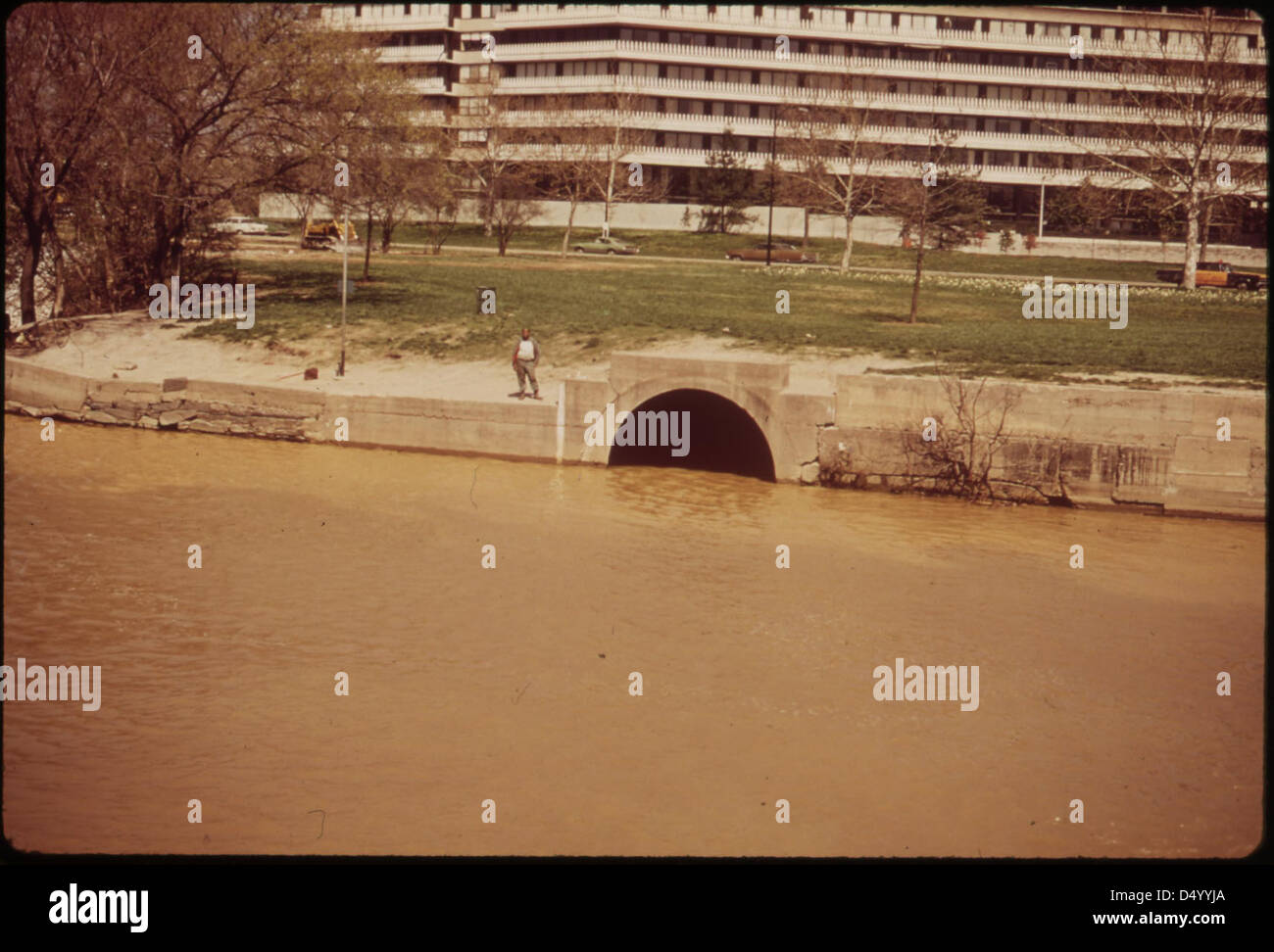 A 1973 photograph showing raw sewage flowing into the Potomac River ...