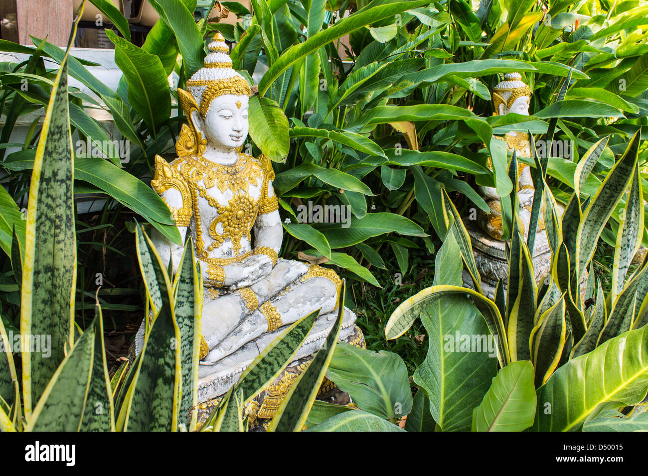 Sitting deva statue Stock Photo - Alamy