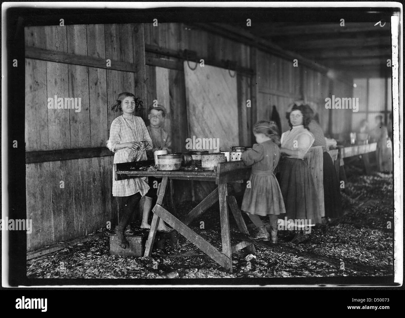 In March 1911, Lewis Hine captured a group of shrimp pickers at ...