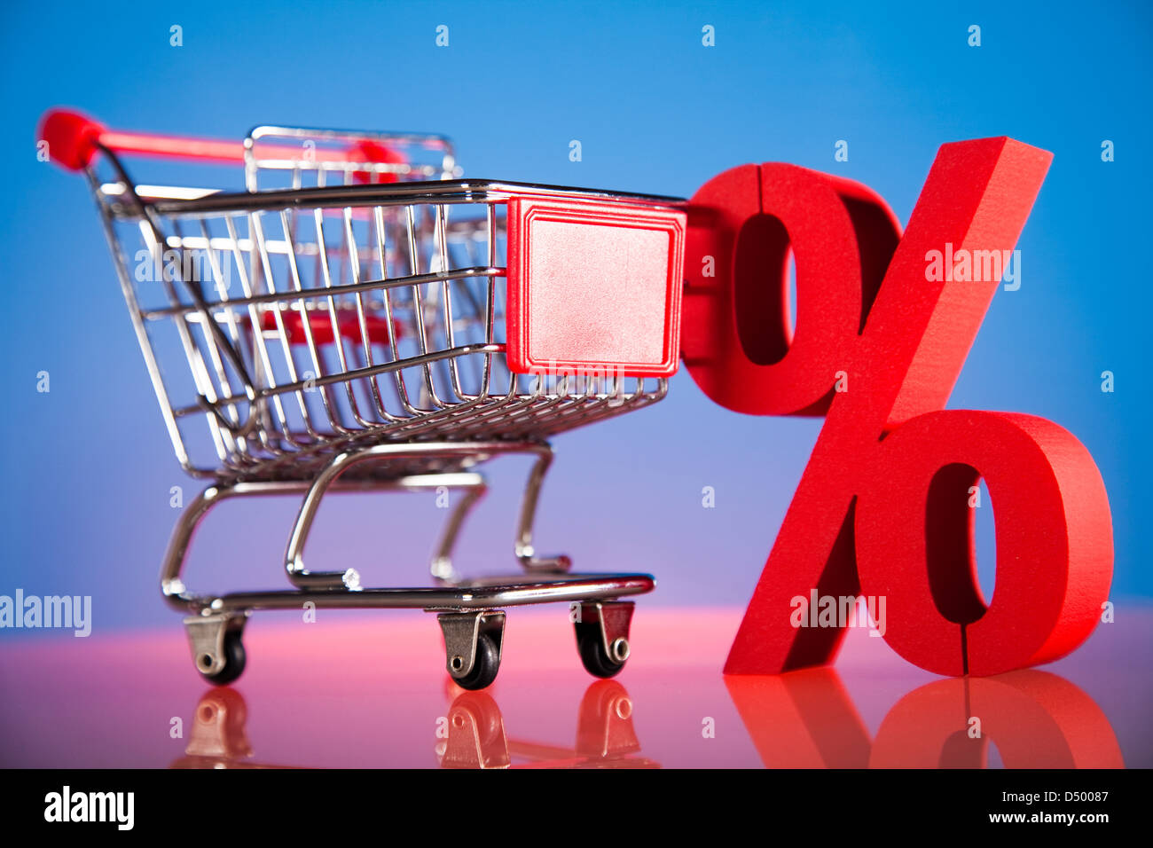 Shopping supermarket cart, percent sign Stock Photo - Alamy