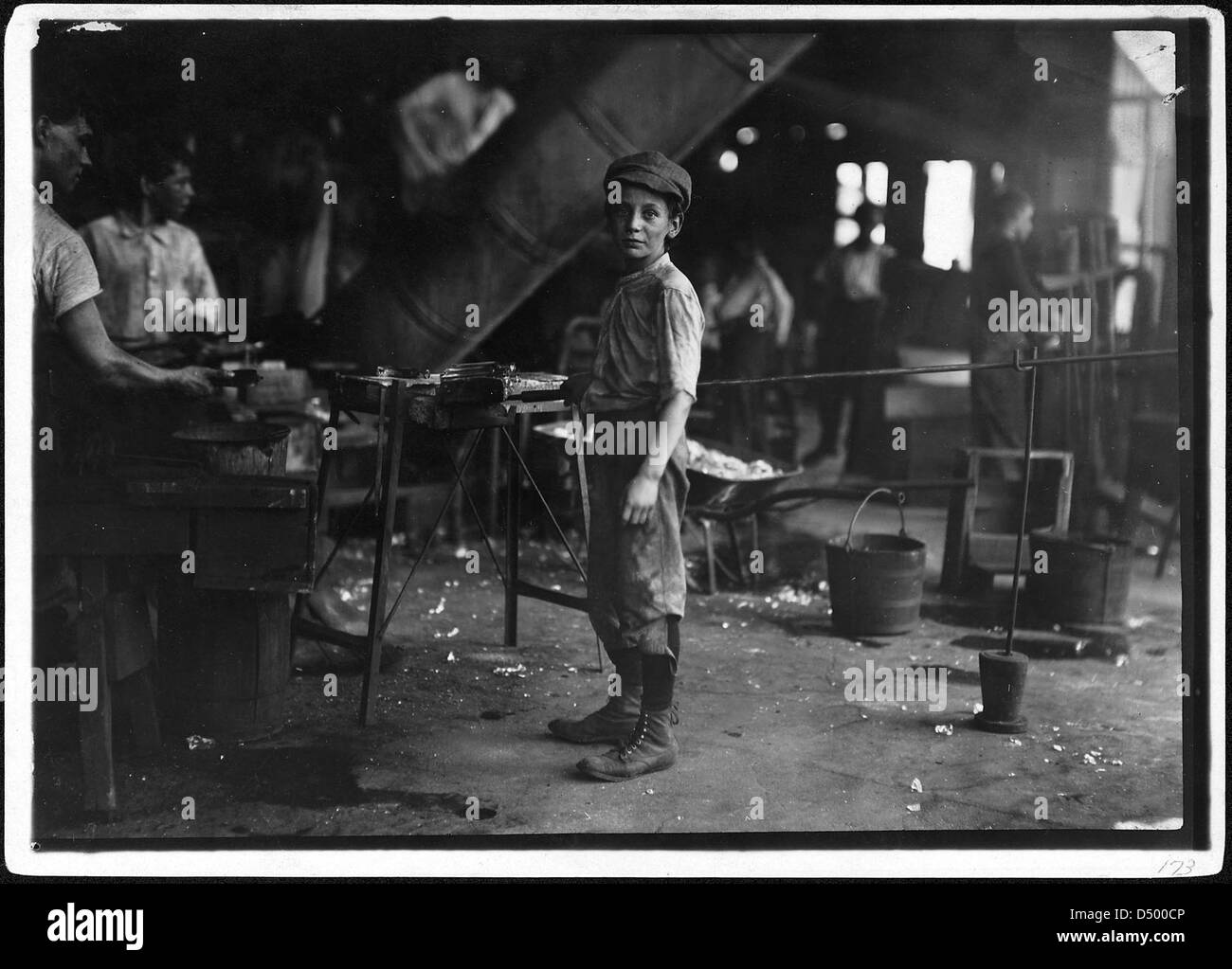 A 1911 photograph by Lewis Hine showing Rob Kidd, a glass factory ...