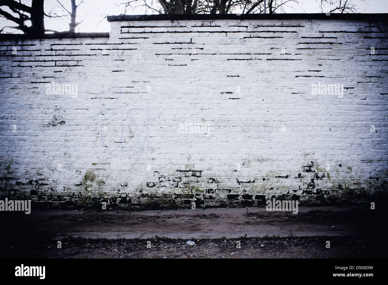 White wall on path Stock Photo - Alamy