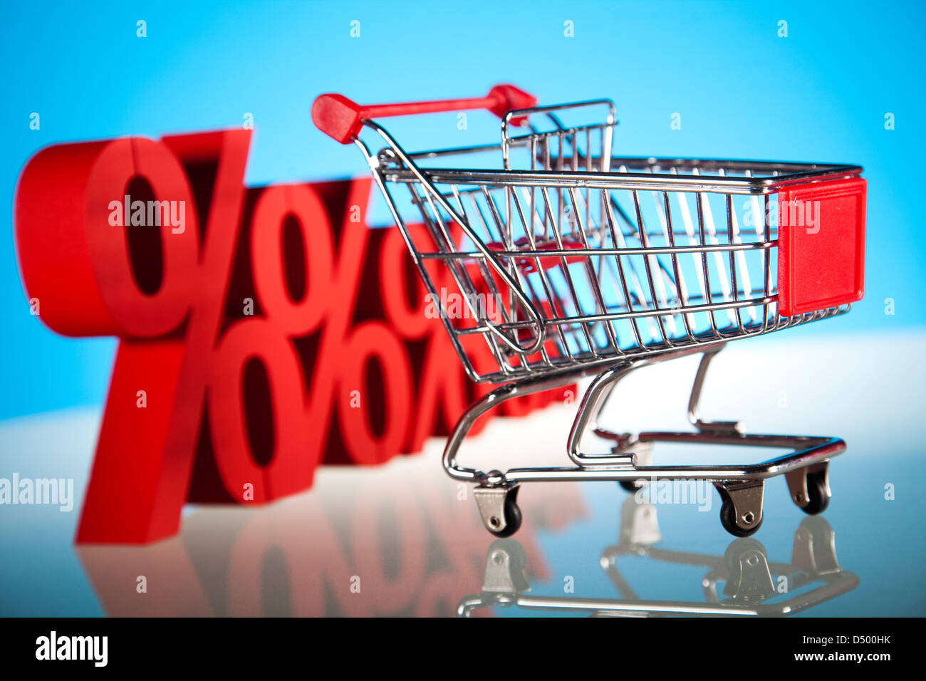 Shopping supermarket cart, percent sign Stock Photo - Alamy