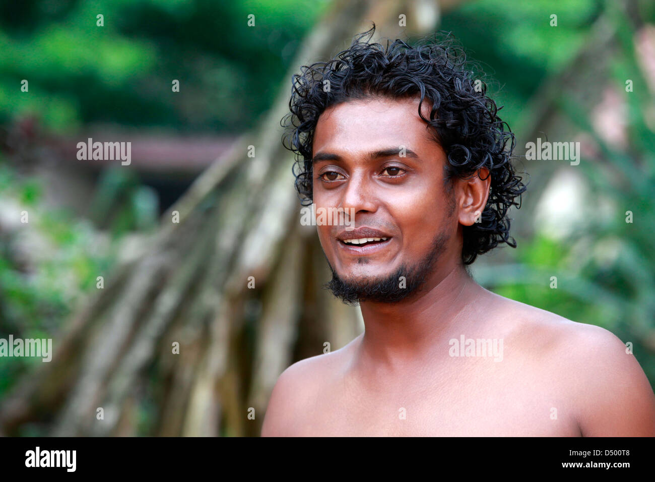 Portrait young men on a green background. Sri Lanka Stock Photo - Alamy