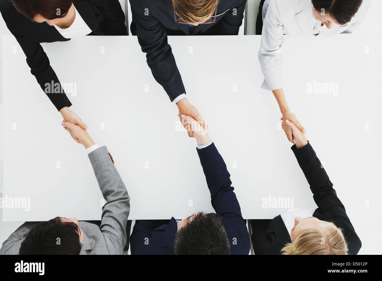 Business handshake multiple hi-res stock photography and images - Alamy