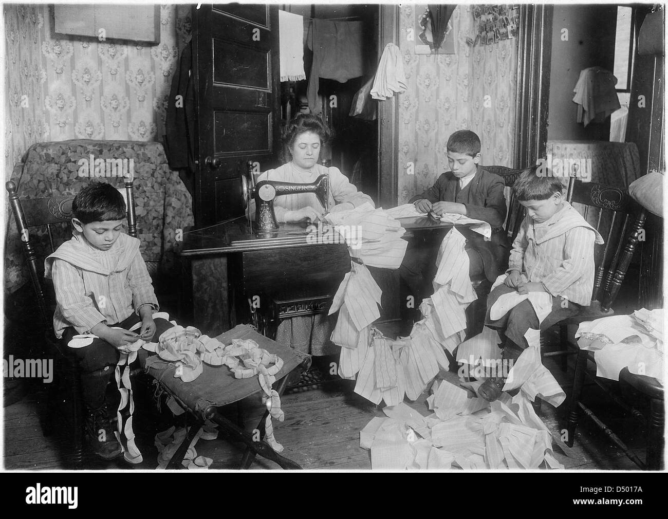 In March 1912, Lewis Hine photographed a 12-year-old boy working in a ...