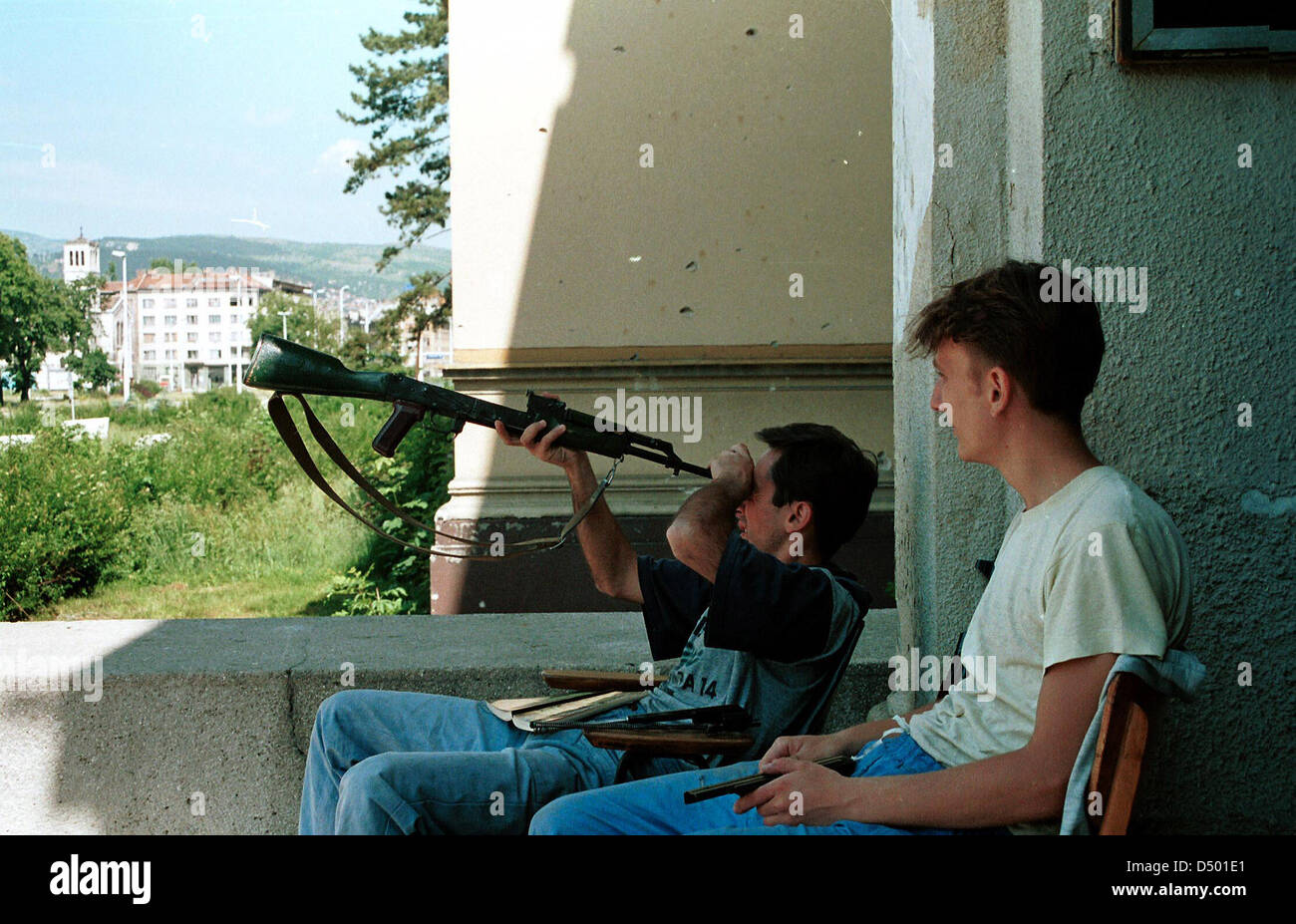SARAJEVO, BOSNIA, 22 MAY 1992 --- Bosnian government soldiers check ...
