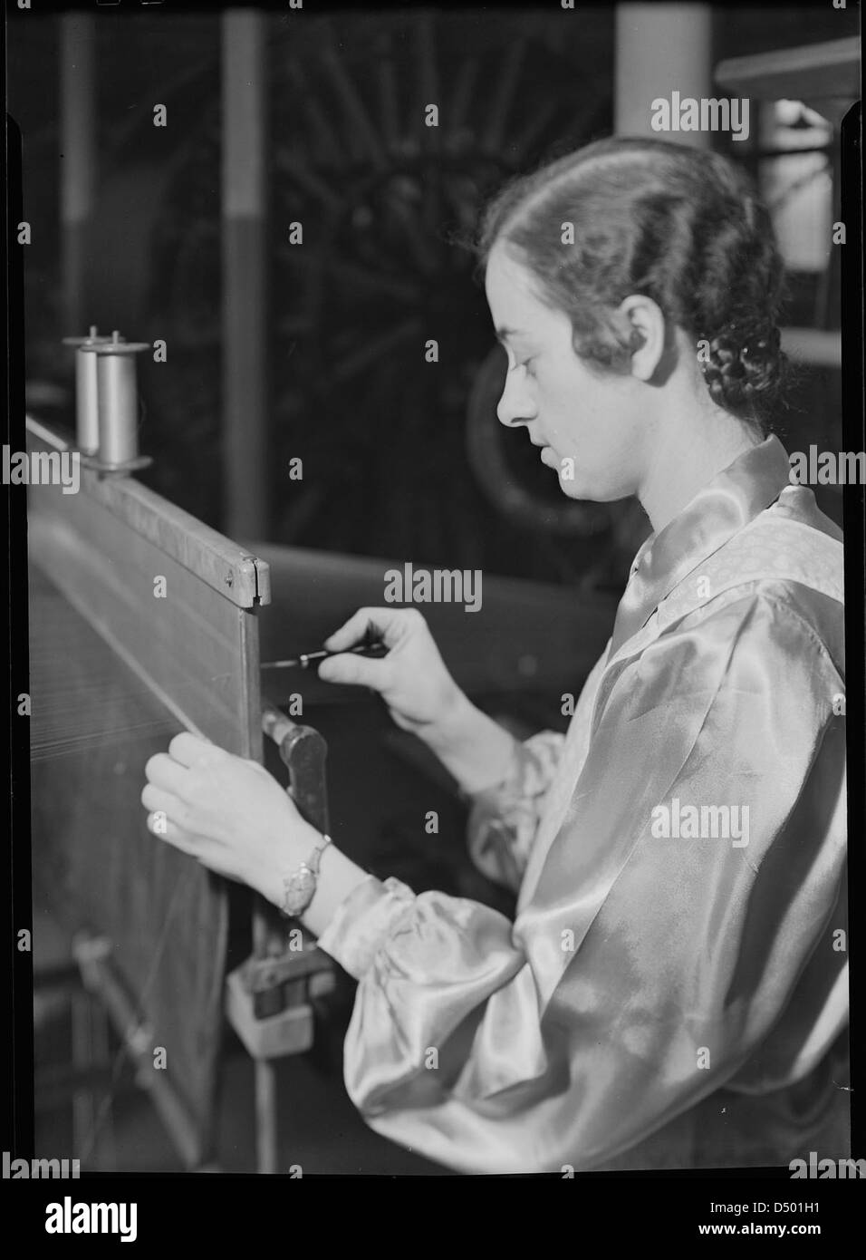 A 1936 photo by Lewis Hine showing silk manufacturing processes at ...