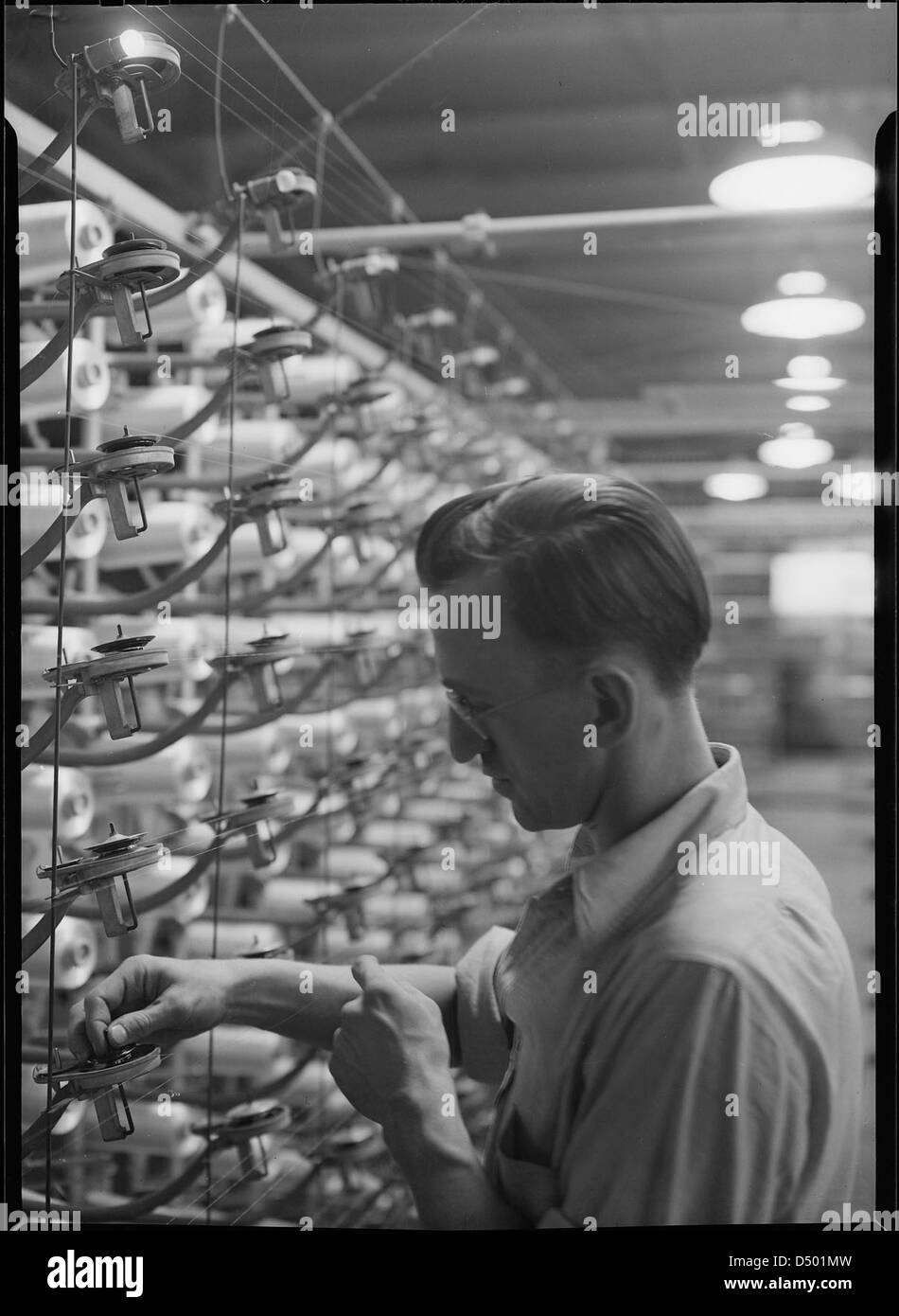 A photograph from 1936 showing rayon warping at William Skinner and ...
