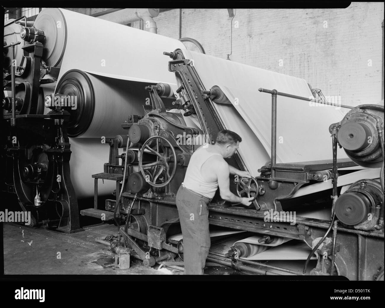 A photograph from 1936 showing a cylinder machine at the American ...