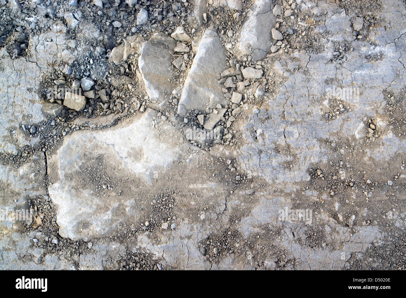 full frame natural background with multicolored dry loam and pebbles ...