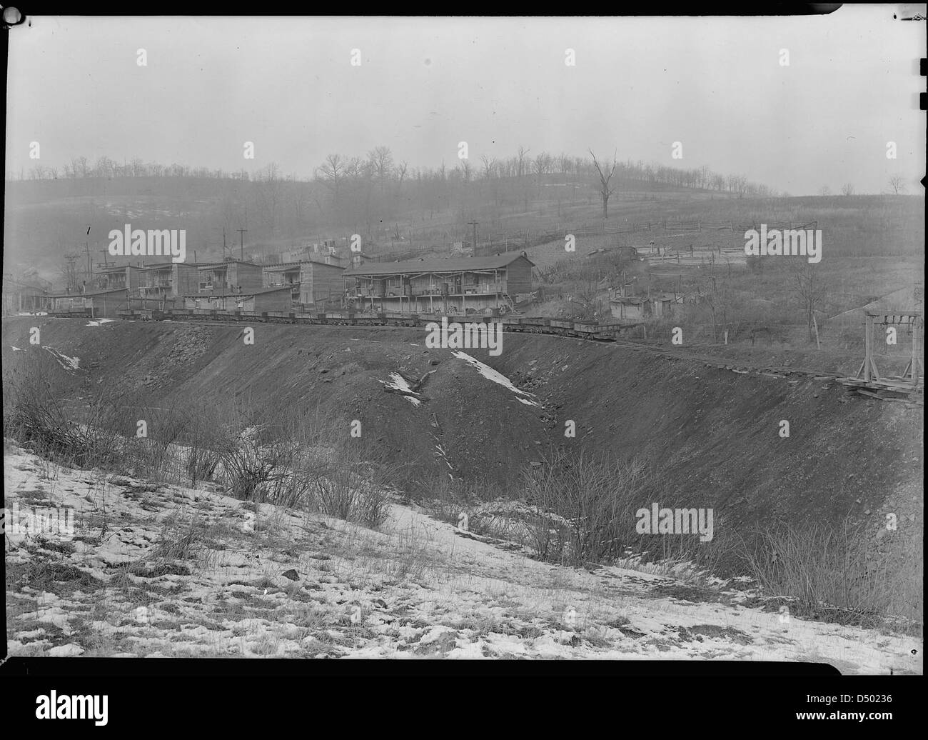 This 1936 photograph by Lewis Hine shows Chaplin Hill, a mining camp in ...