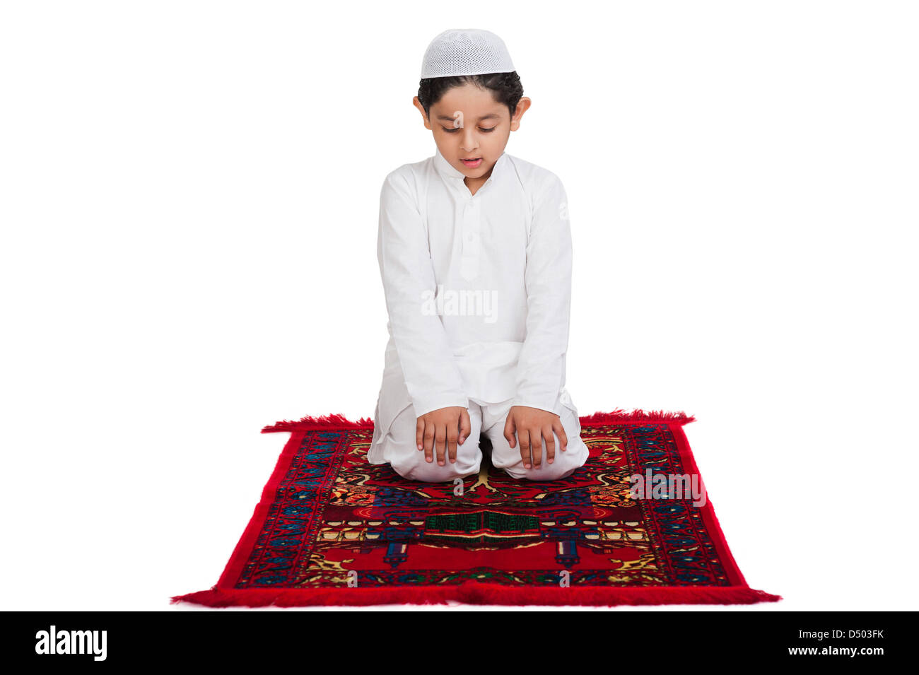 Muslim boy praying Stock Photo - Alamy