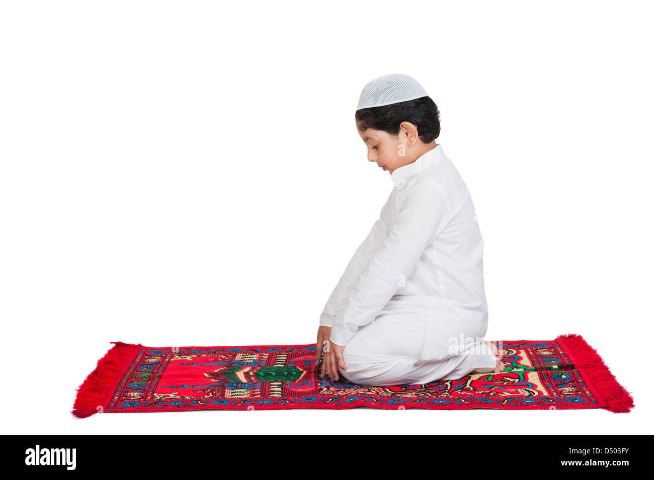 Muslim boy praying Stock Photo - Alamy