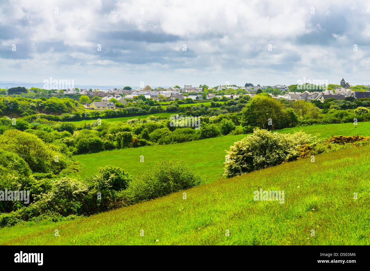 The village of Delabole viewed over meadows in springtime, Cornwall ...
