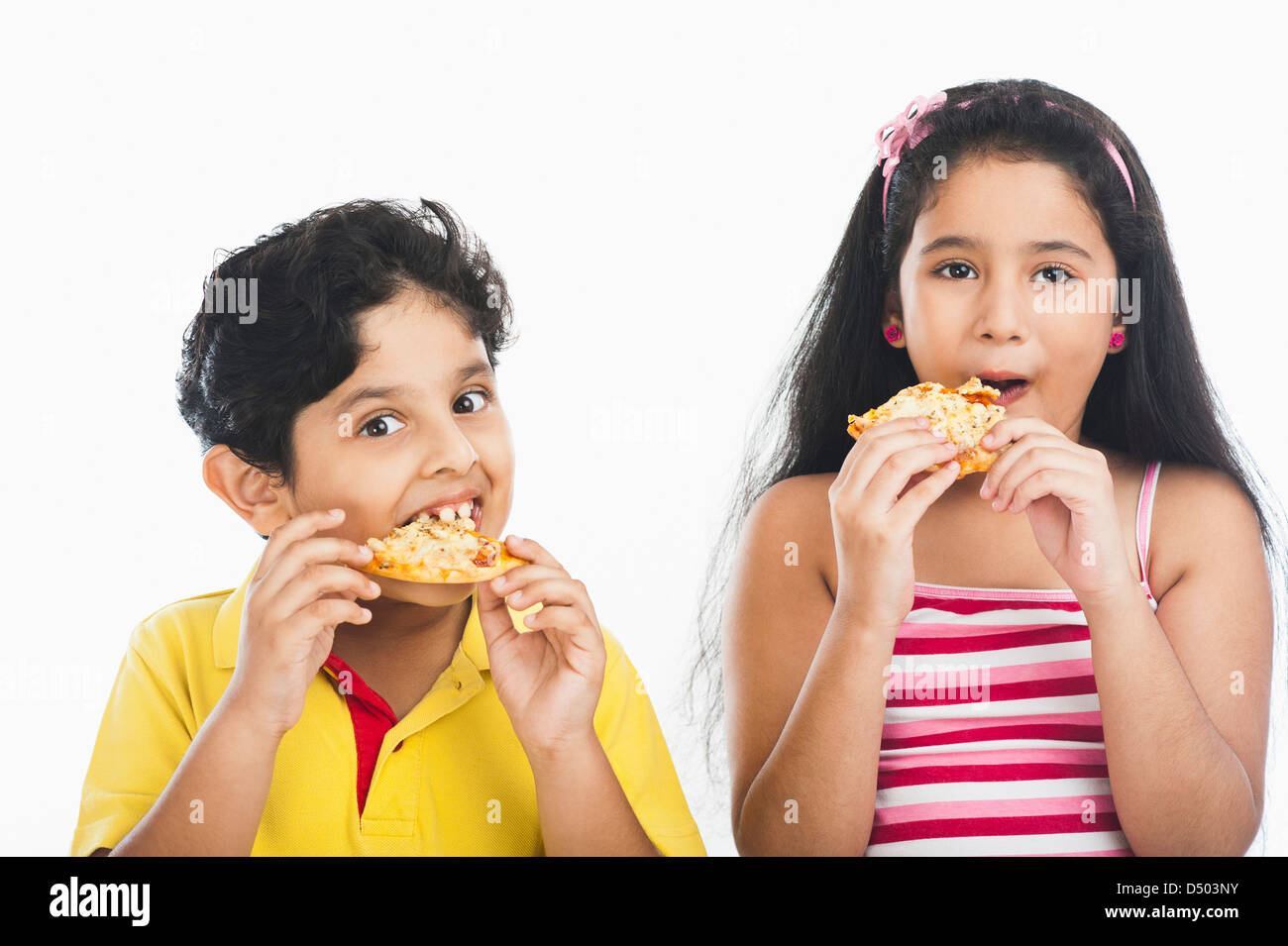 Children eating pizza Stock Photo - Alamy