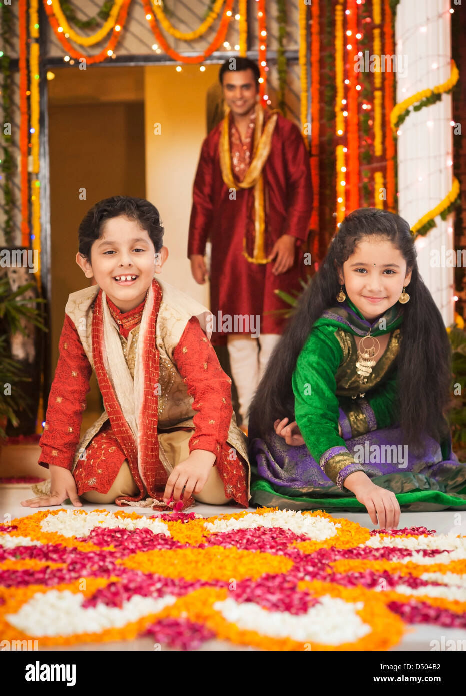 Children making rangoli on Diwali Stock Photo - Alamy