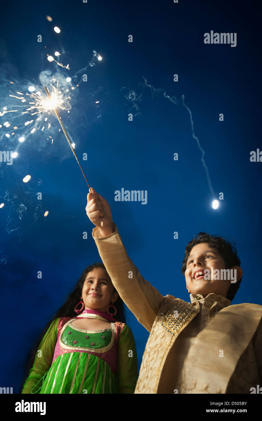 Indian people fire crackers hi-res stock photography and images - Alamy